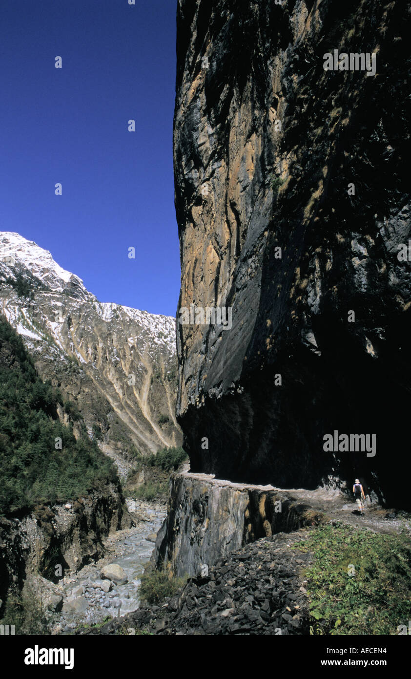 Mountain path along magnificent cliff in Dharapani surroundings ...