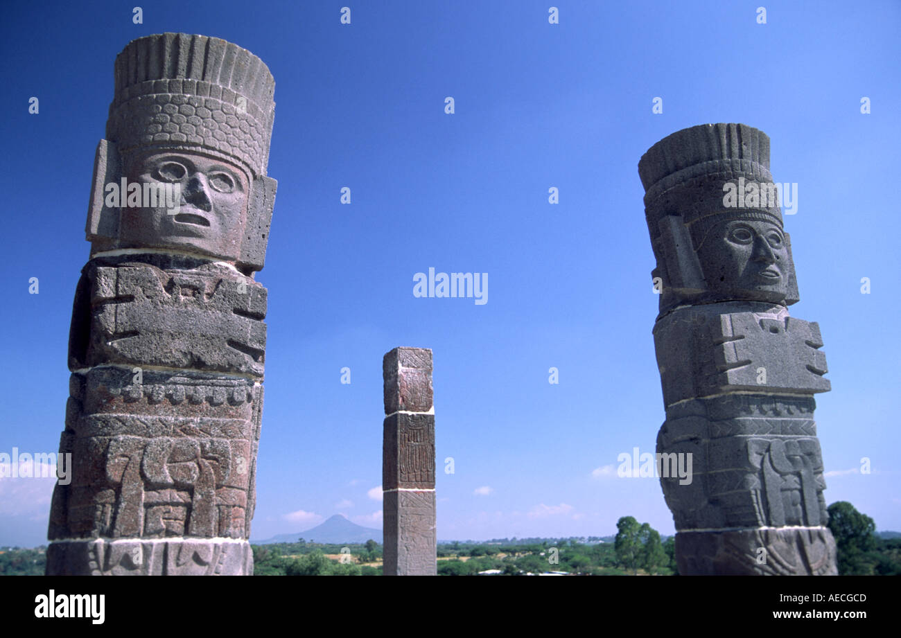 Carved stone figures stand against the sky in the ancient ...