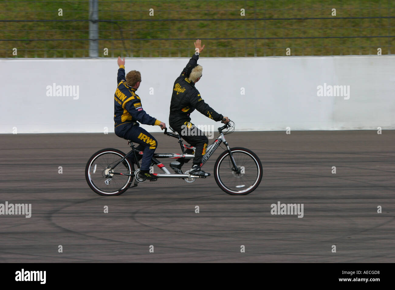 Shaun Richardson and Gavin Seager riding a tandem on the drivers parade ...