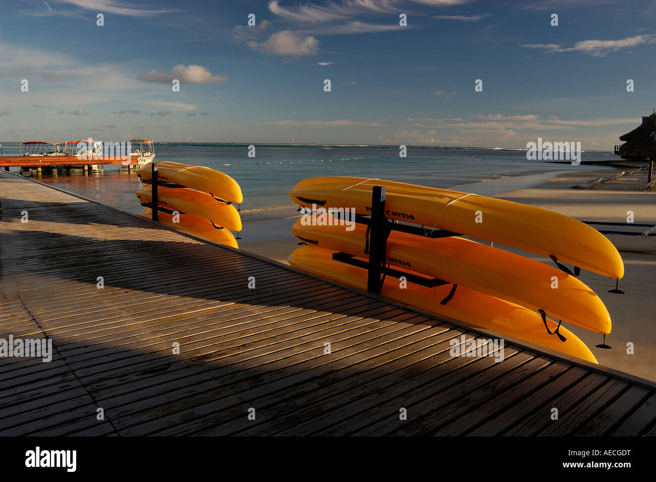 Tahitian Outrigger Canoes in soft morning light Stock Photo - Alamy
