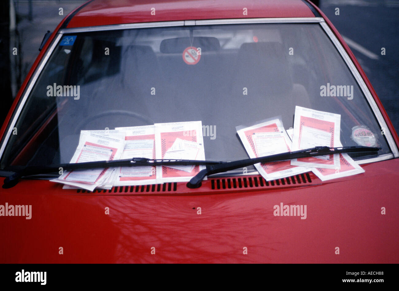 multiple parking ticket fines on a car windscreen Stock Photo - Alamy