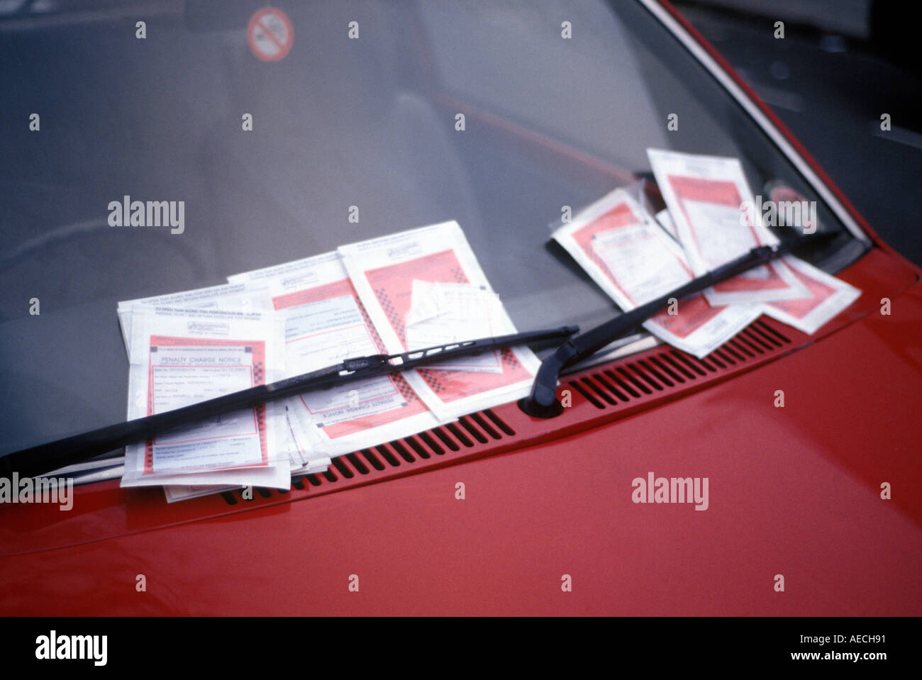 multiple parking ticket fines on a car windscreen Stock Photo - Alamy