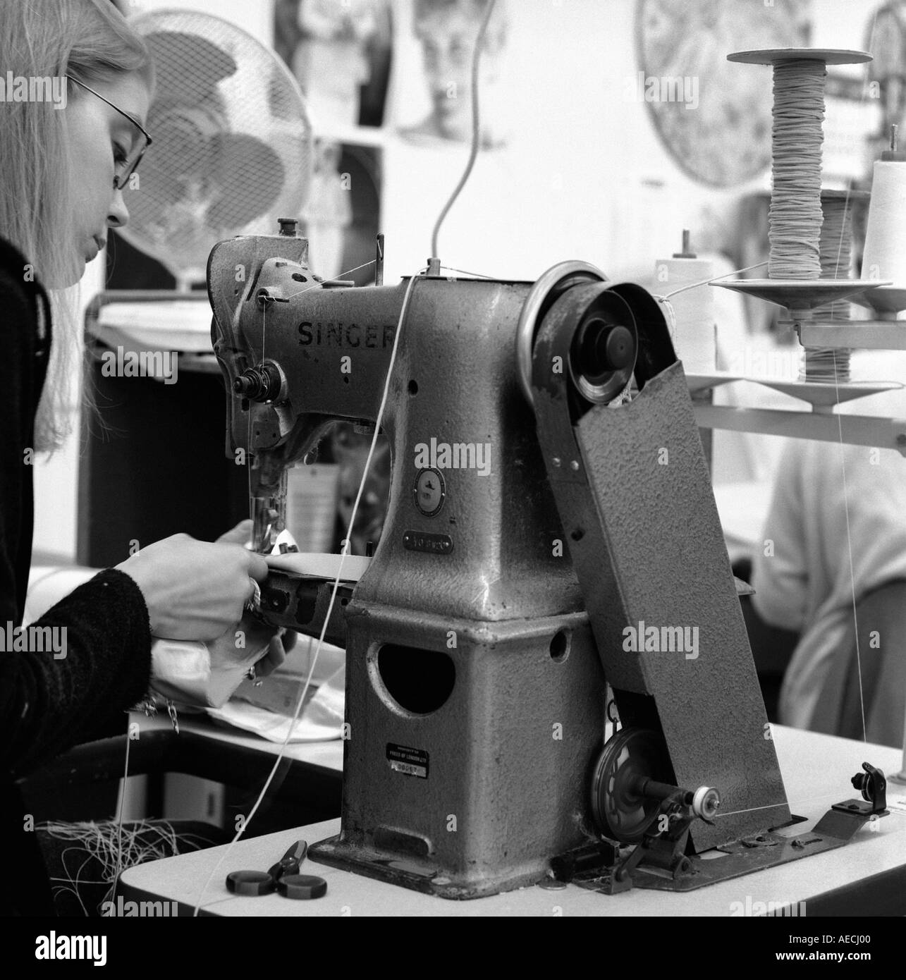 Machine sowing Black and White Stock Photos & Images - Alamy
