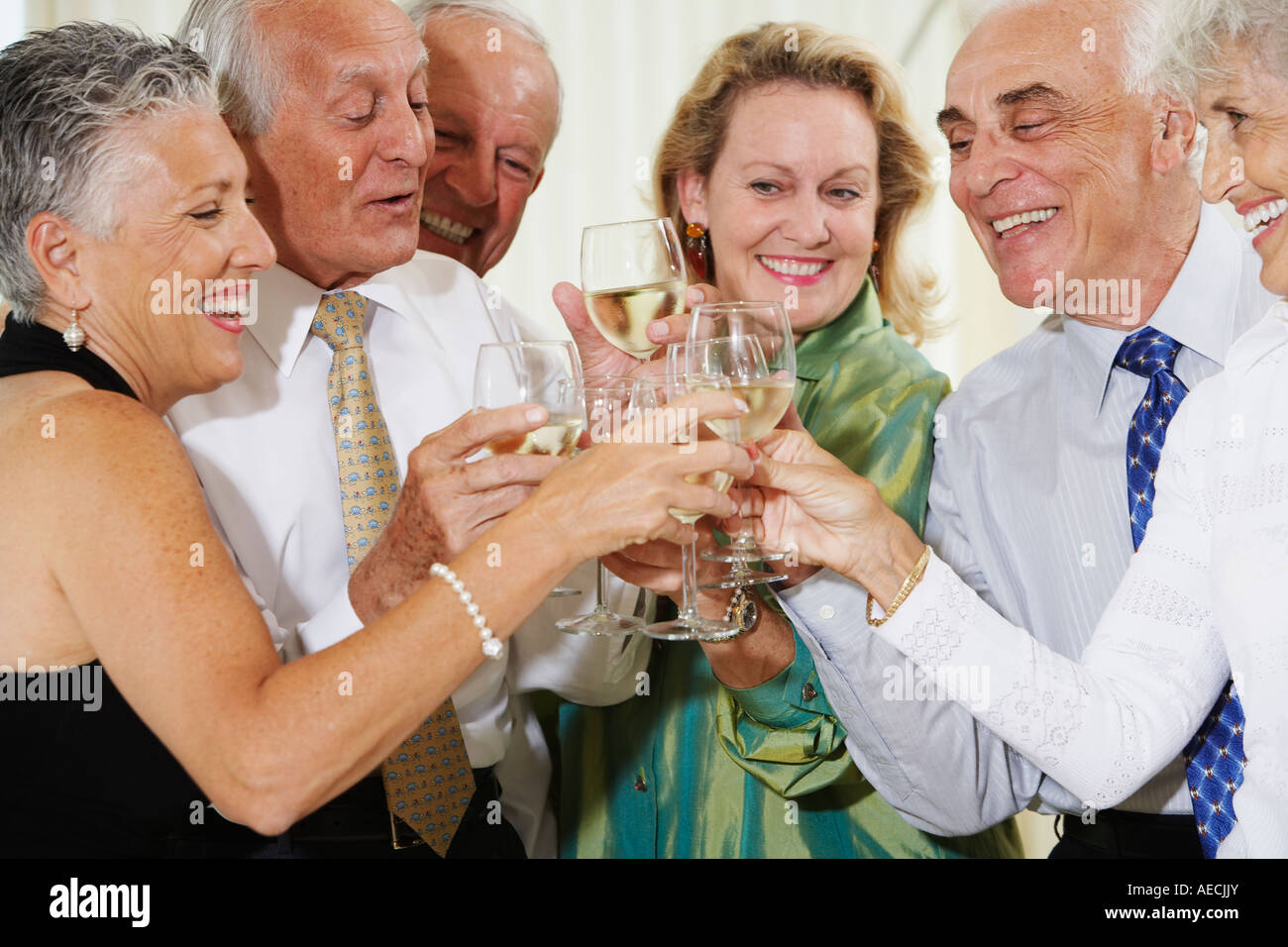Senior couples toasting at party Stock Photo - Alamy