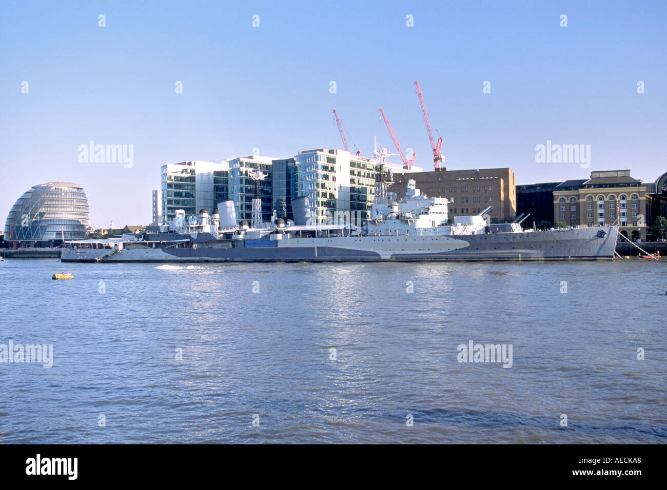 The HMS Belfast moored on the Thames River south bank in London Stock ...