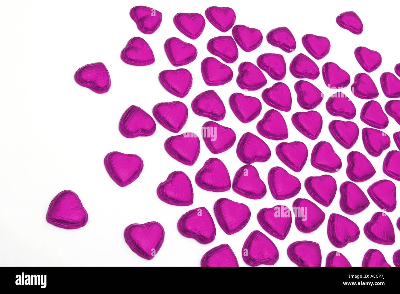 many violet chocolate hearts Stock Photo - Alamy