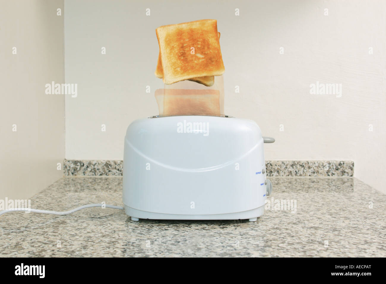 toast is bouncing out of a toaster Stock Photo - Alamy