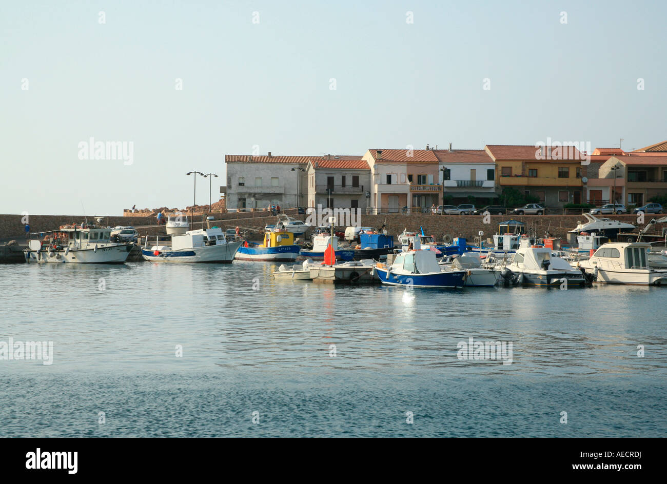 Town harbour at Isola Rossa, Sardinia, Italy Stock Photo - Alamy