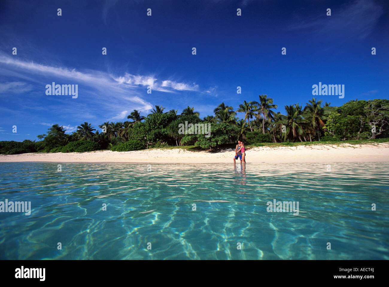Tonga, Malinoa Island, Couple On Beach Stock Photo - Alamy