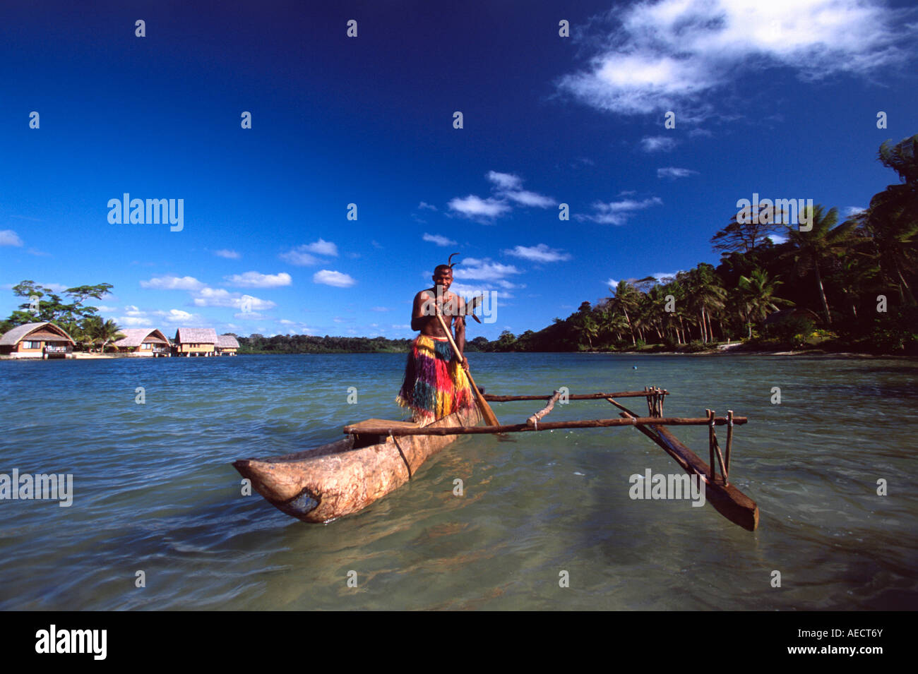 Vanuatu, Local man Rowing Canoe Stock Photo - Alamy