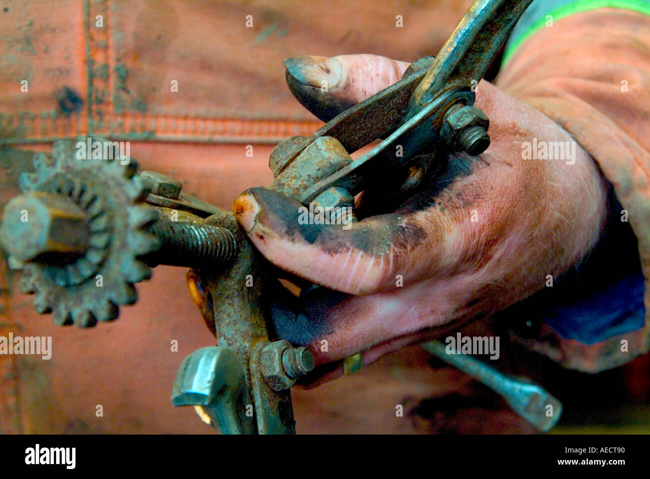 mechanic holding tools in his hands Stock Photo - Alamy