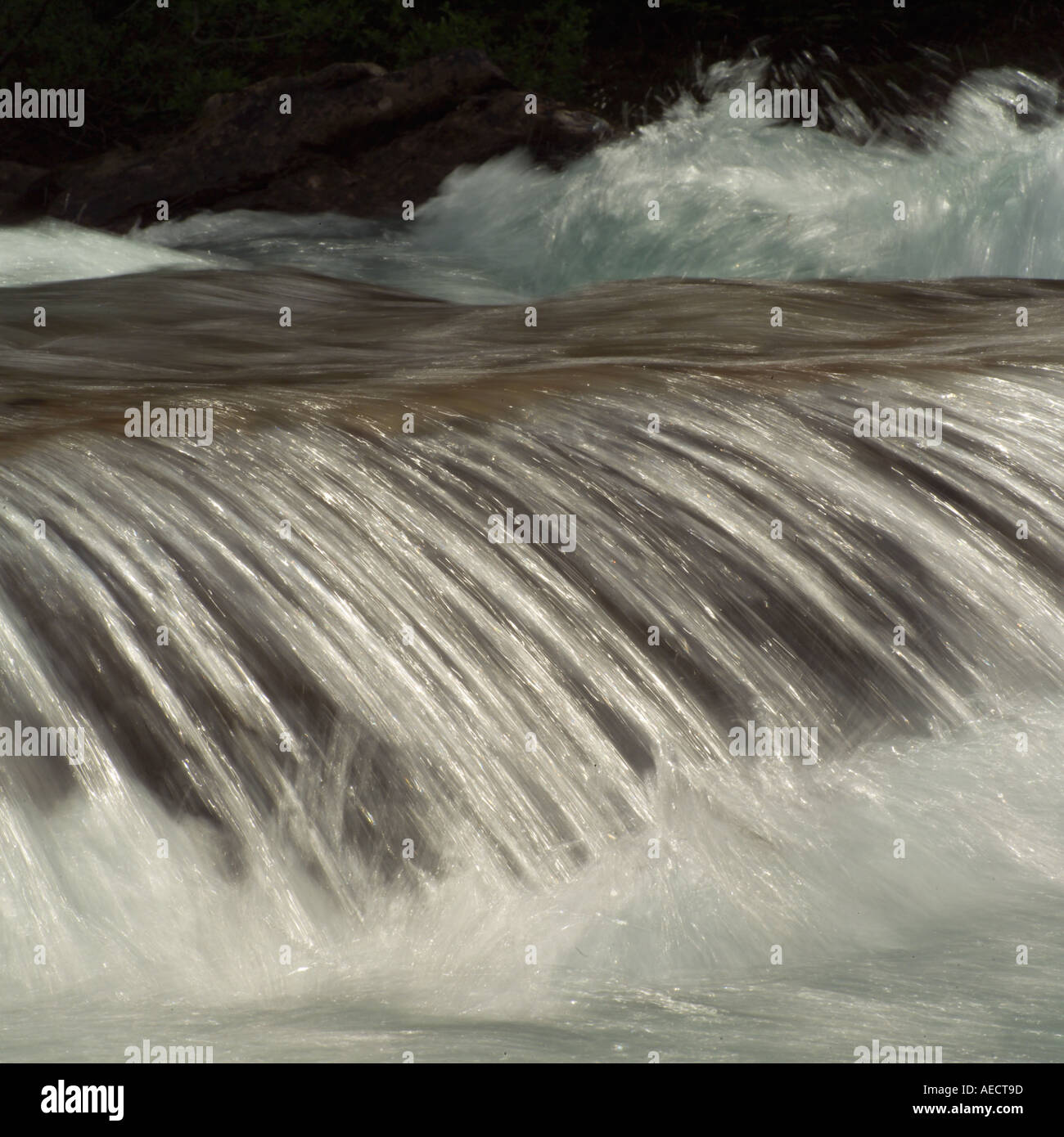 Water rushing over rocks Mt Robson Provincial Park Canada Stock Photo ...