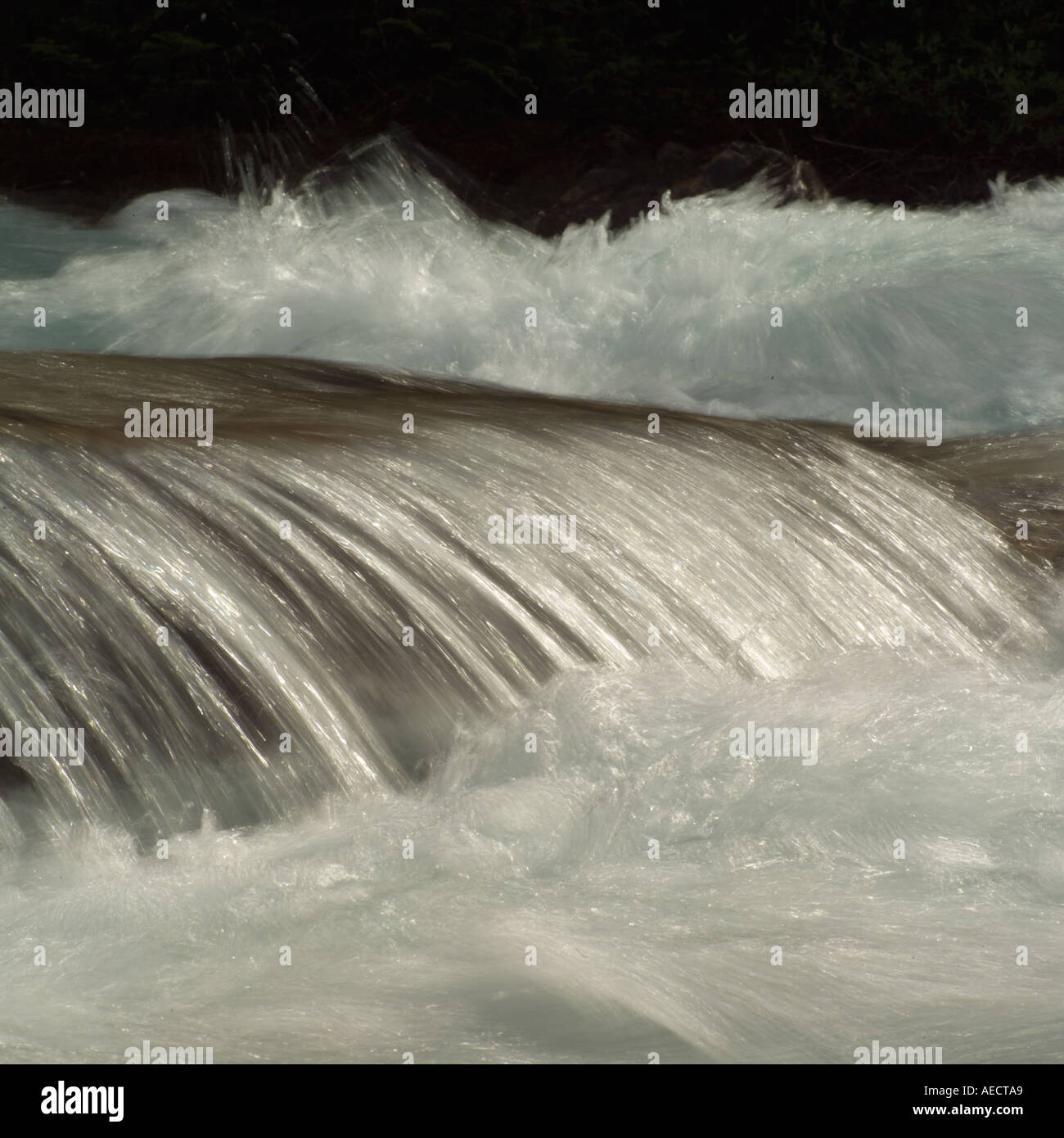 Water rushing over rocks Mt Robson Provincial Park Canada Stock Photo ...