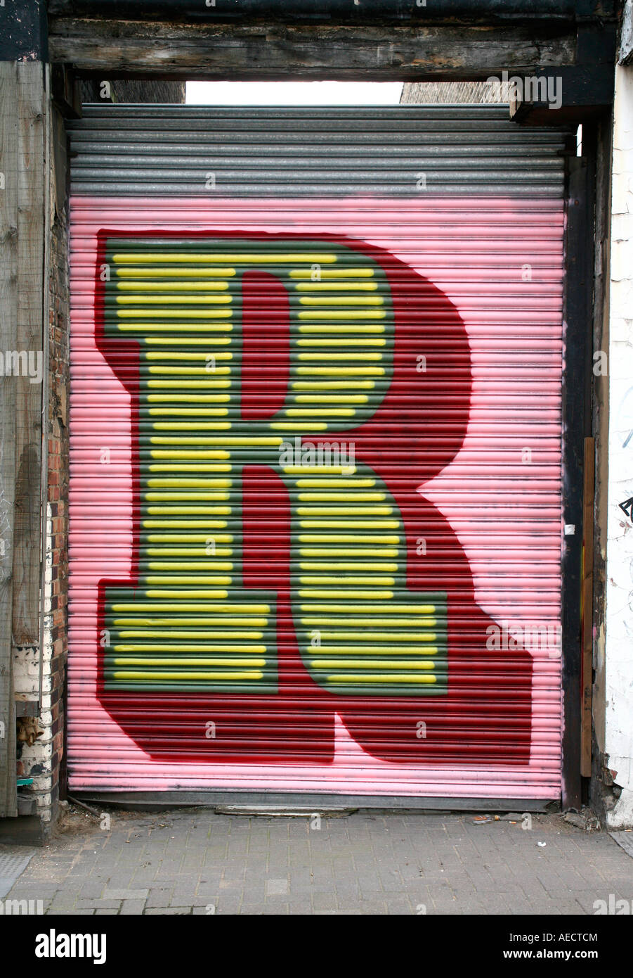 Letter R painted by EINE on shutter in Shoreditch, London Stock Photo ...