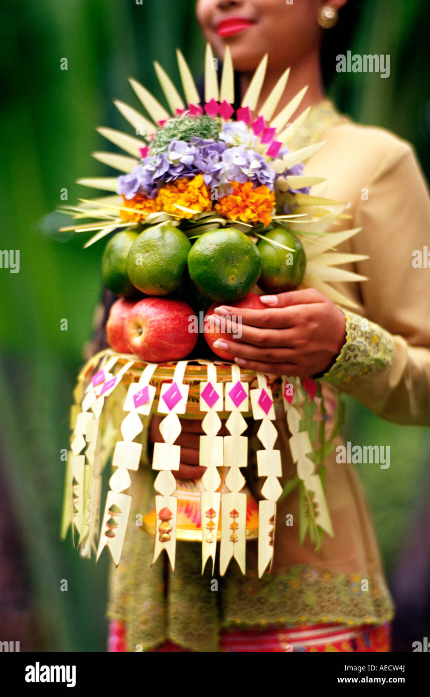 Bali, Balinese Girl Carrying Fruit, Day Stock Photo - Alamy