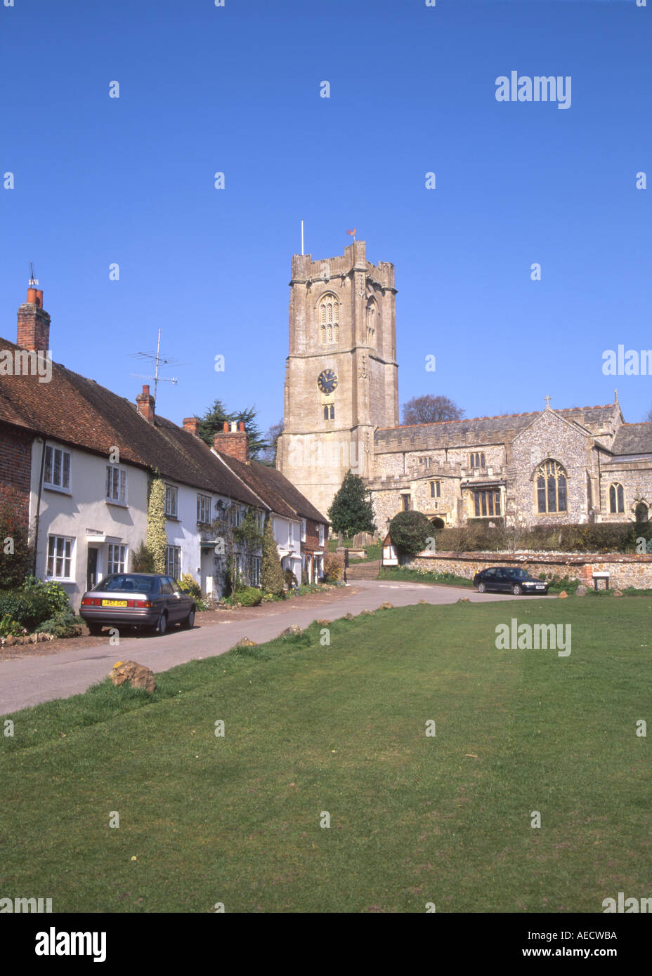 Aldbourne Wilts UK church market cross and village green Stock Photo ...
