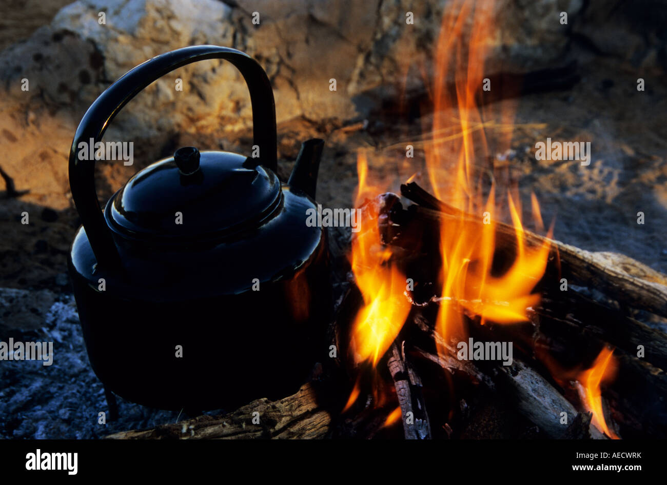 Close up, kettle boiling water on outdoor camp fire, backgrounds ...