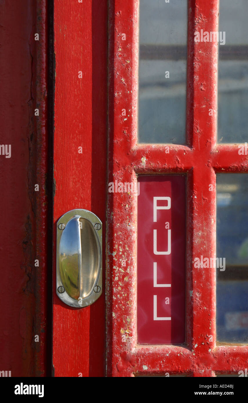 Red telephone box door handle hi-res stock photography and images - Alamy