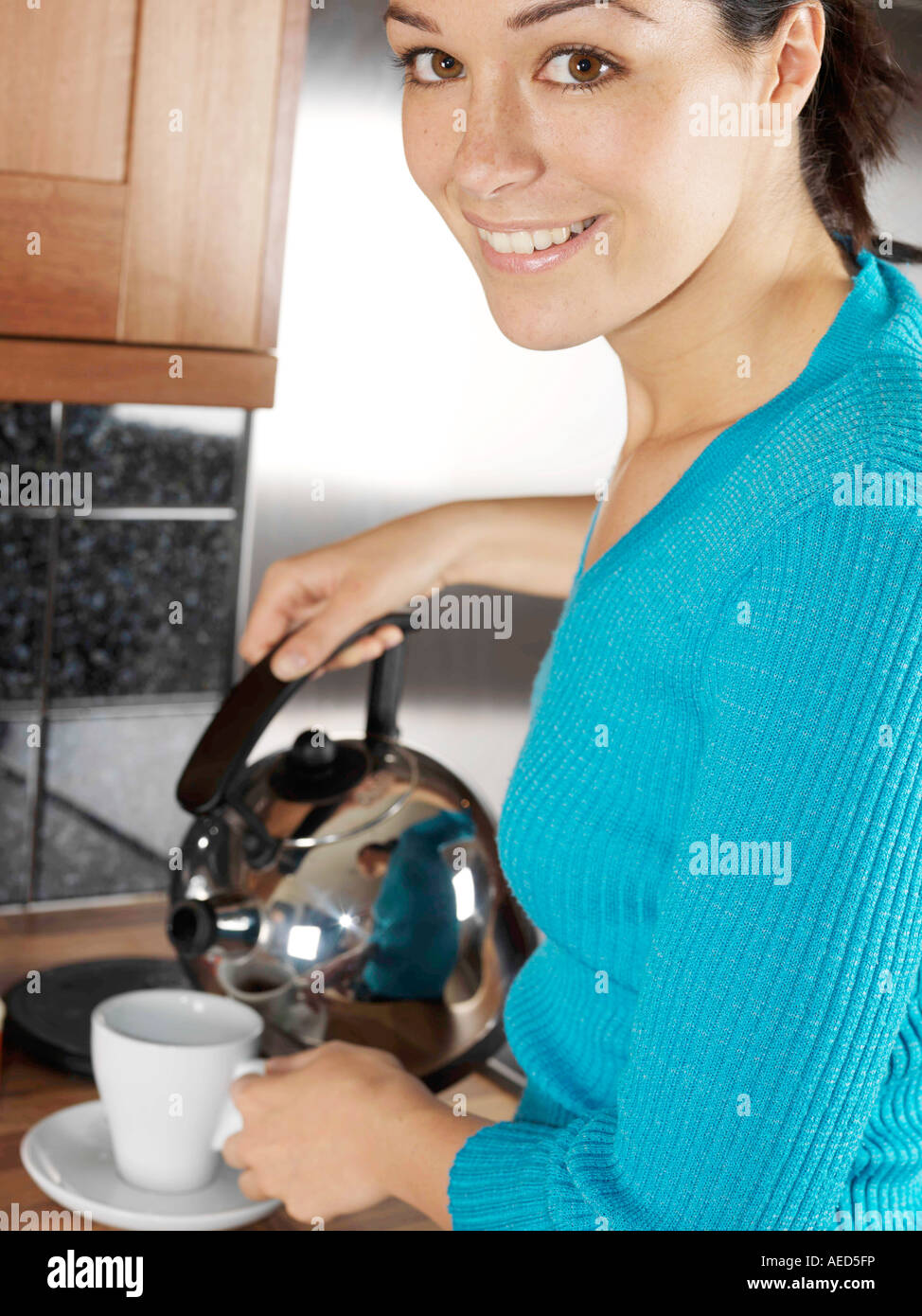 Woman Making Tea Model Released Stock Photo - Alamy