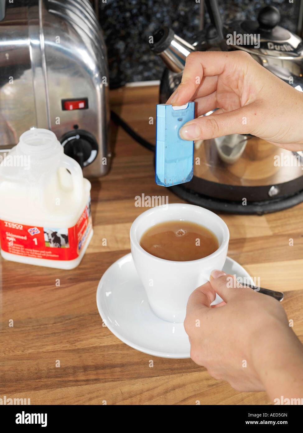 Woman Making Tea Model Released Stock Photo - Alamy
