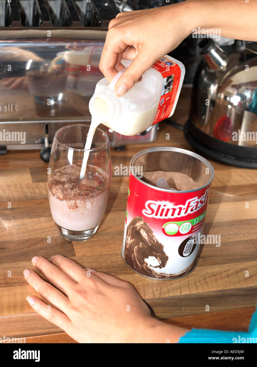 Woman Making Slimfast Milkshake Model Released Stock Photo - Alamy