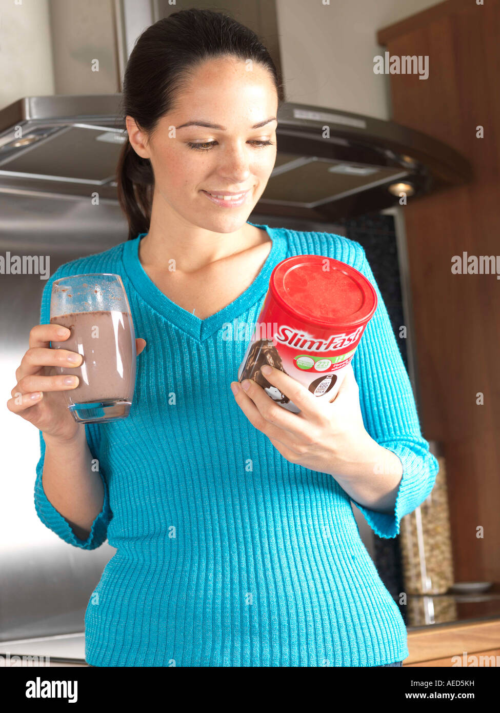Woman Making Slimfast Milkshake Model Released Stock Photo - Alamy
