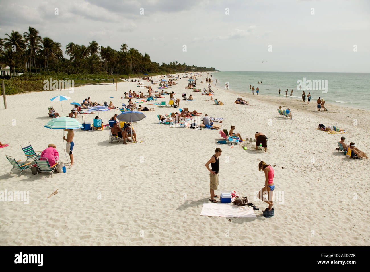 people enjoyiong the beach and sea at Naples Florida Stock Photo - Alamy