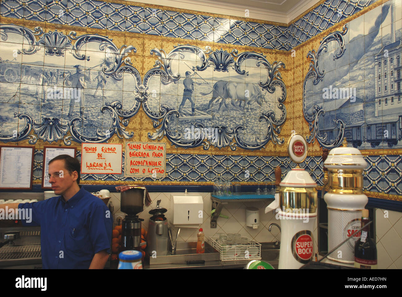 Bartender in traditional bar in Lisbon. Portugal Stock Photo - Alamy