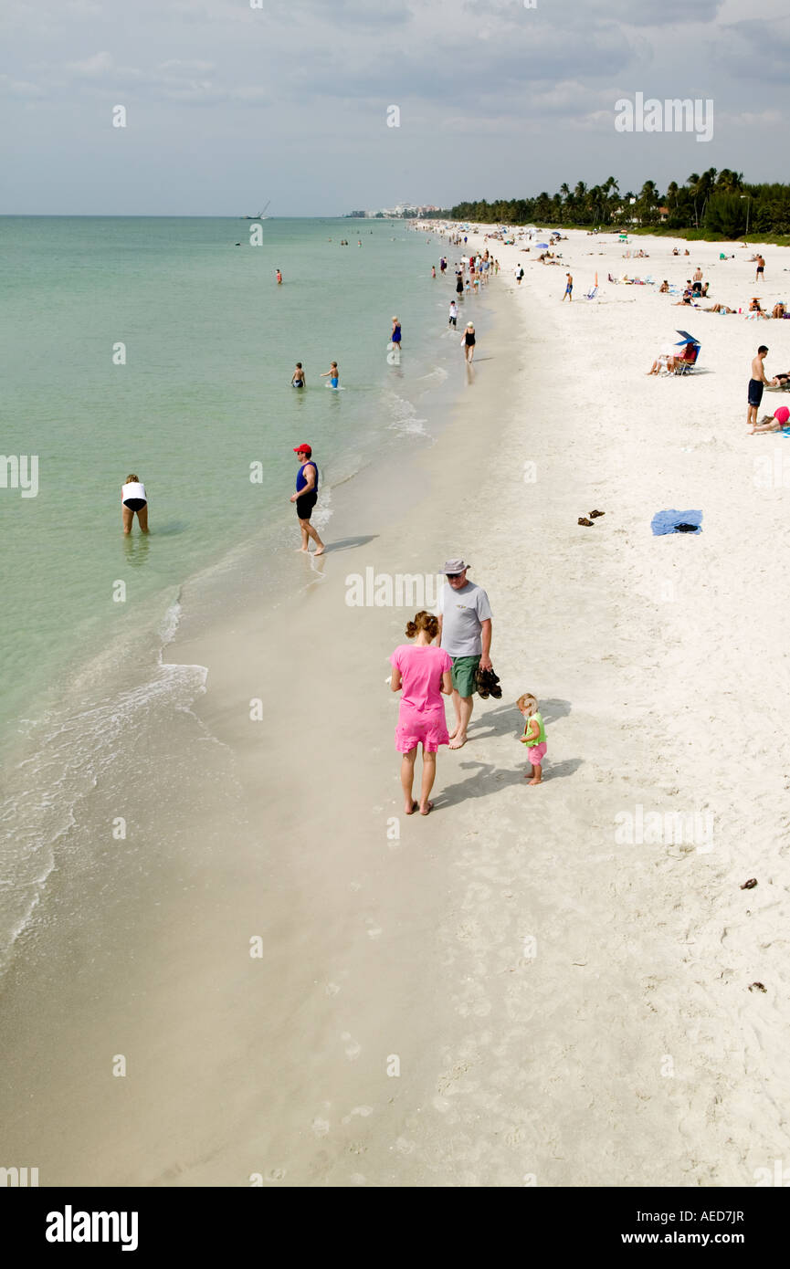 people enjoyiong the beach and sea at Naples Florida Stock Photo - Alamy