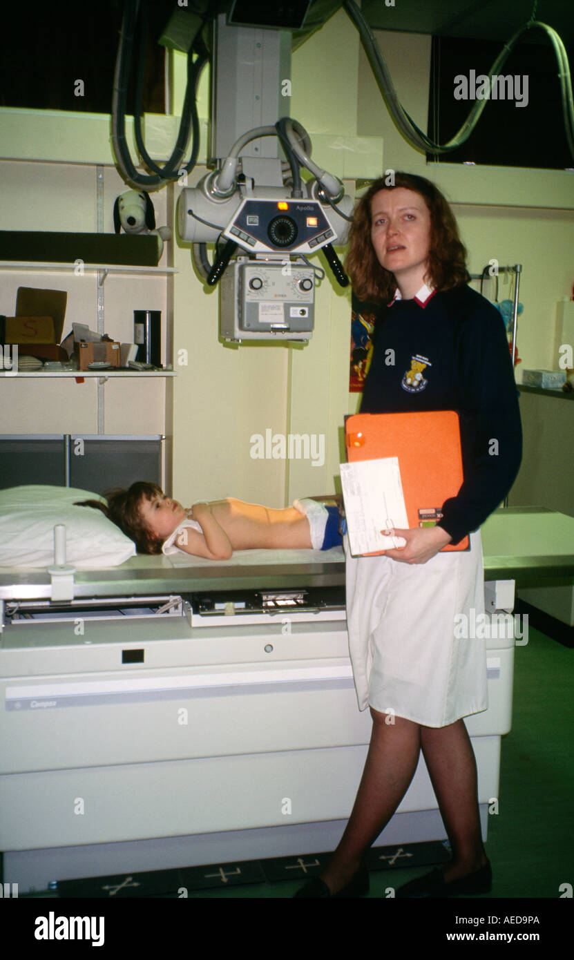 Child Being X-rayed National Health Hospital Nurse In Attendance Stock ...