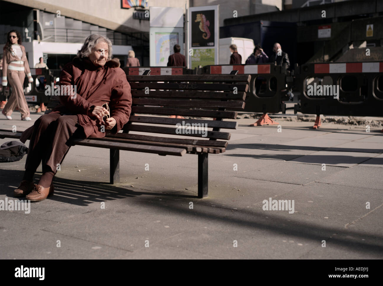 Old woman watcing Stock Photo - Alamy