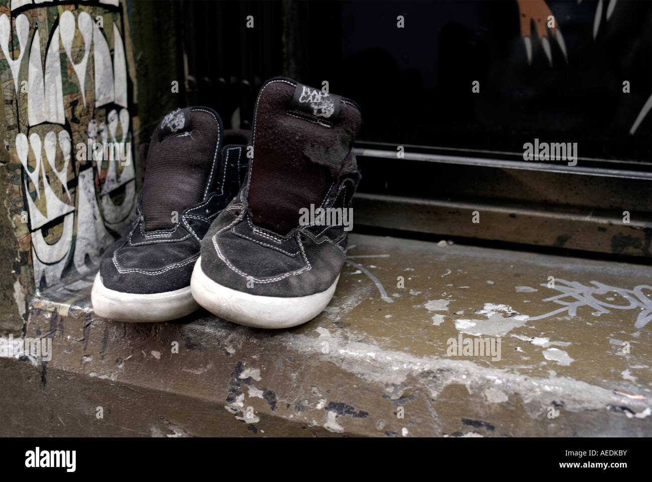 Abandoned pair of shoes Stock Photo - Alamy