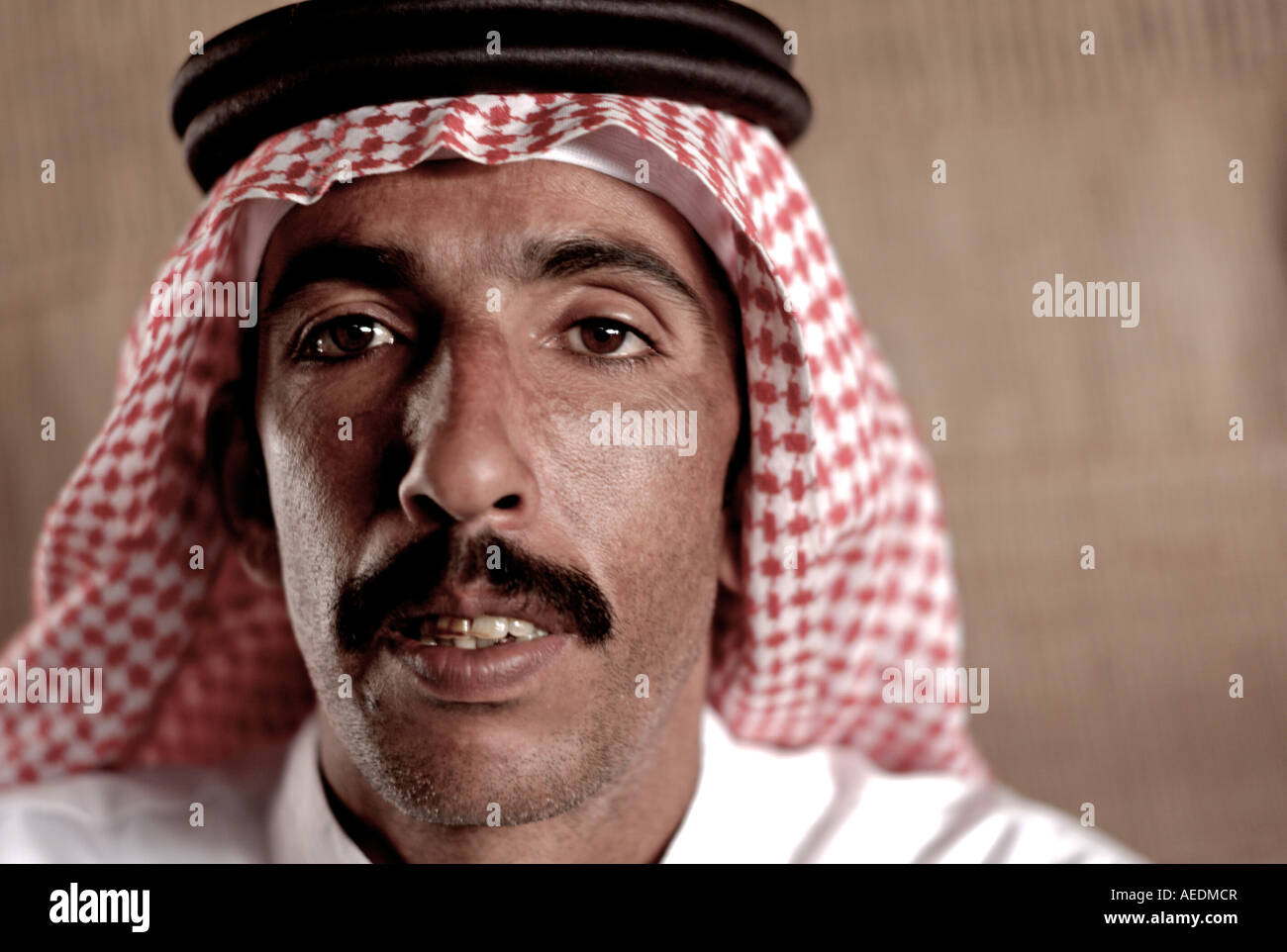 Head shot of arab in traditional clothes Stock Photo - Alamy