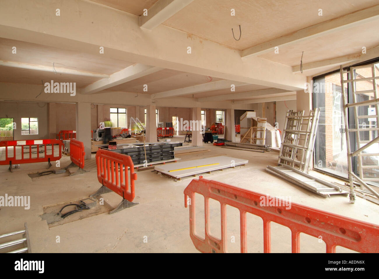 Interior shot of a showroom under construction and being being fitted ...
