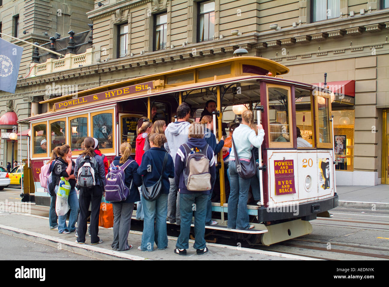 Tourists climbing aboard streetcar in San Francisco CA USA Stock Photo ...