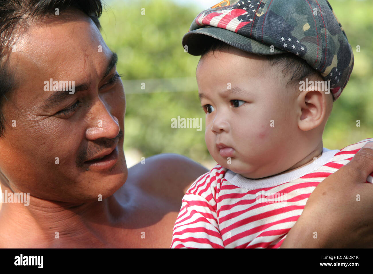 Proud father and son Stock Photo - Alamy