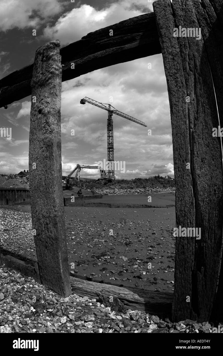 A crane on the Humber foreshore near the Humber bridge, Hessle, East ...