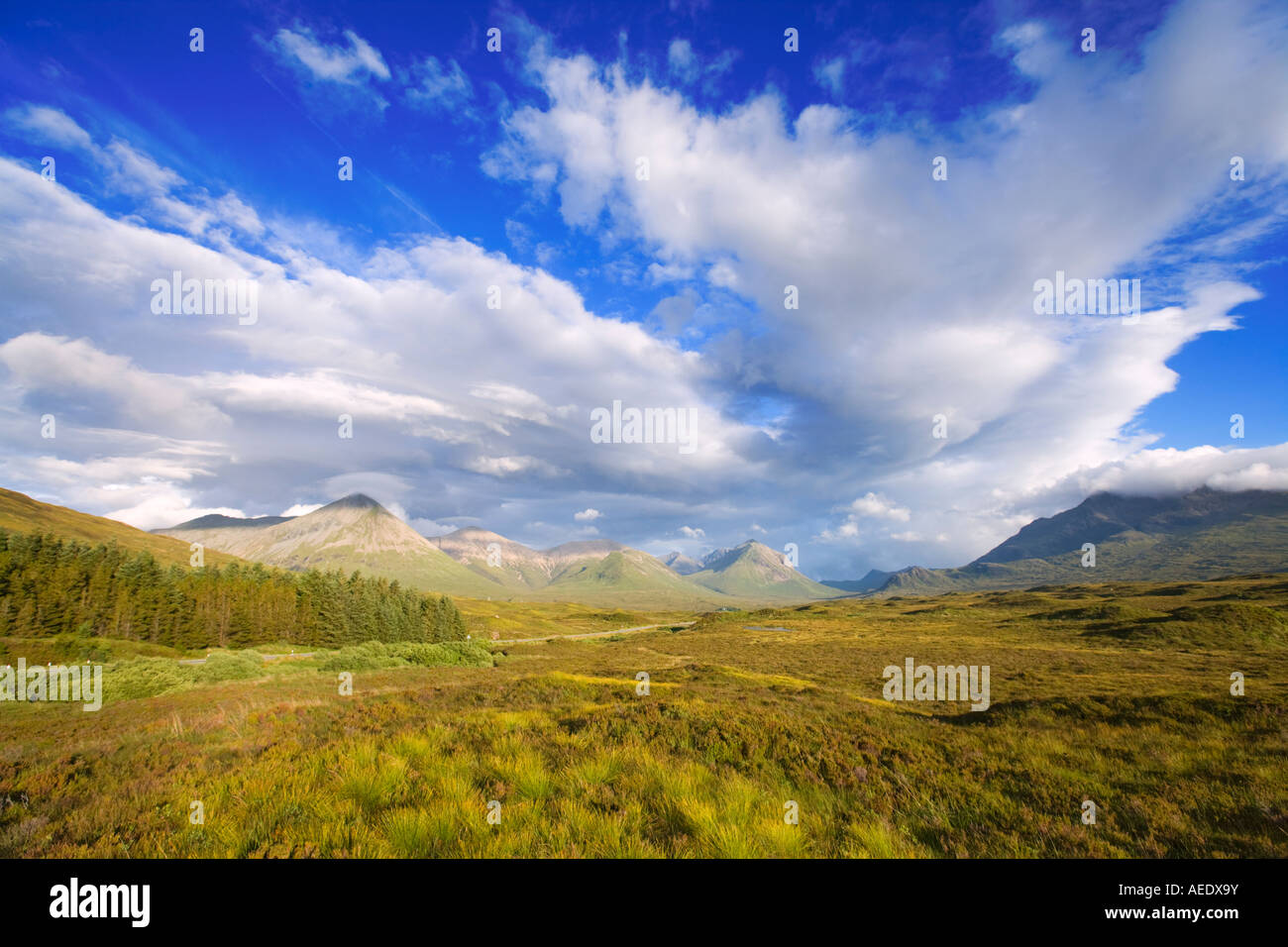 Windswept Clouds And Blue Skies Over The Red Cuillin Hills On This ...