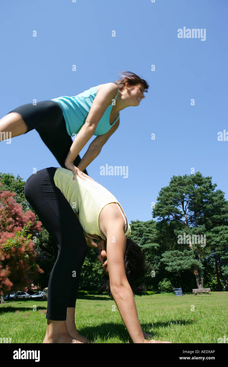 Teenagers Leapfrogging Model Released Stock Photo - Alamy