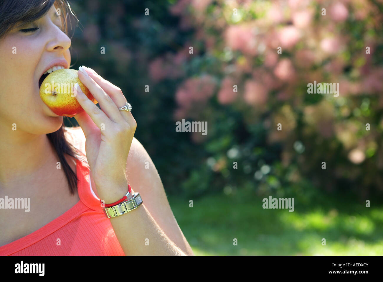 Teenager Eating a Pear Model Released Stock Photo - Alamy