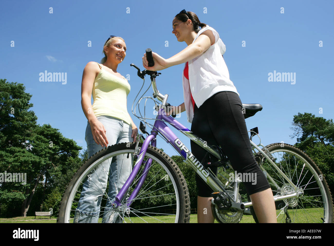 Young Woman Riding Bike Model Released Stock Photo - Alamy