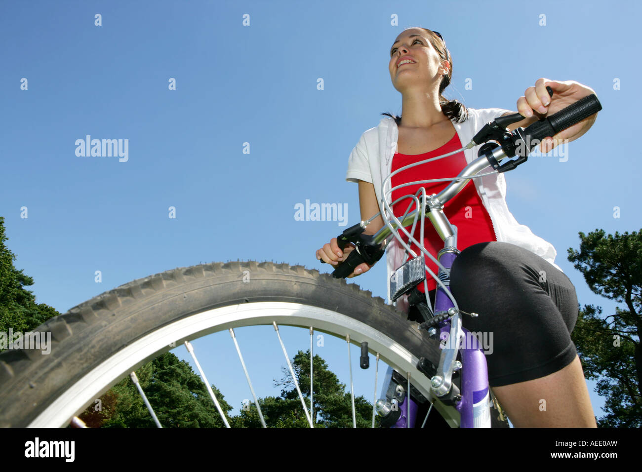 Young Woman Riding Bike Model Released Stock Photo - Alamy