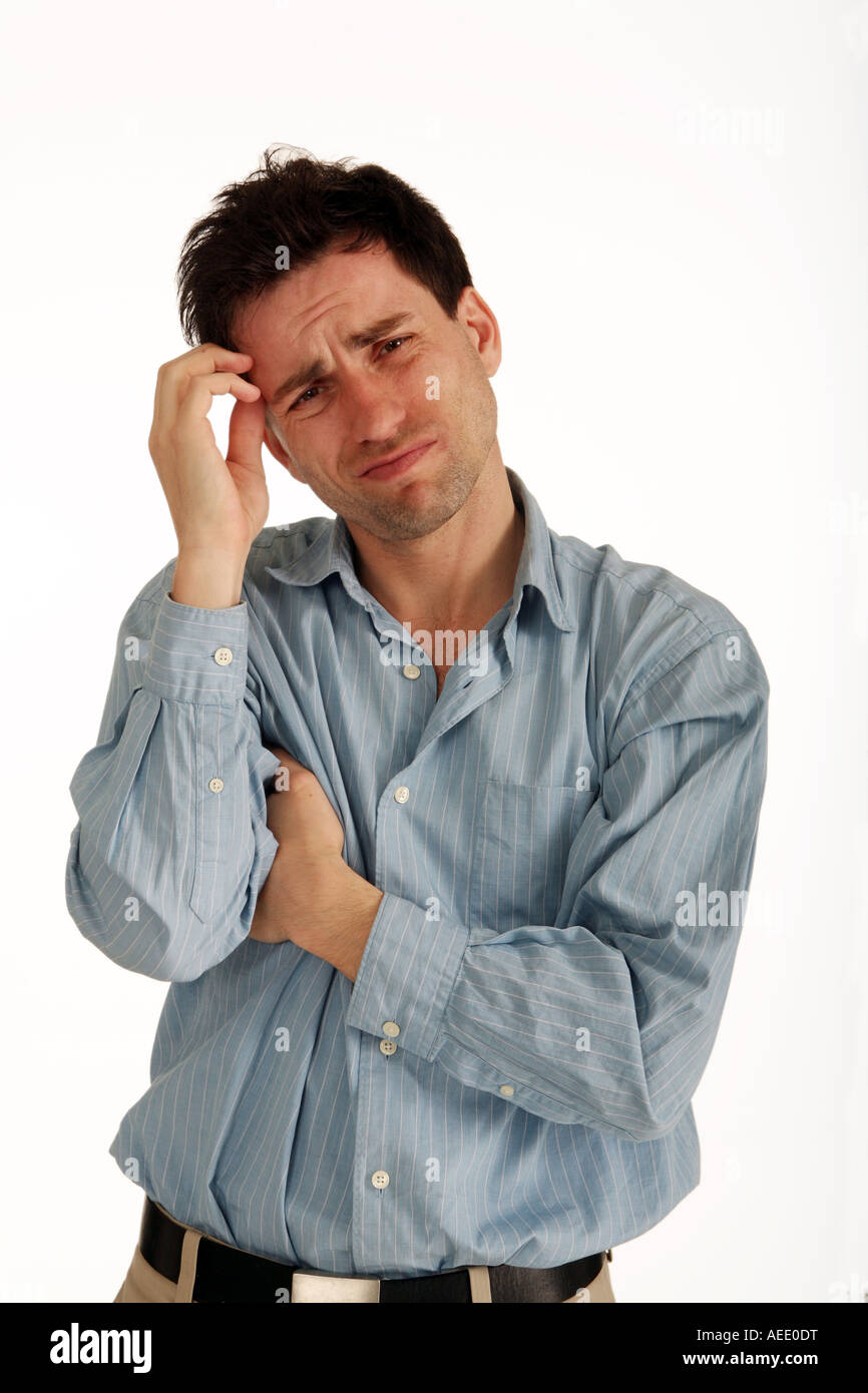 Young man looking confused Stock Photo - Alamy