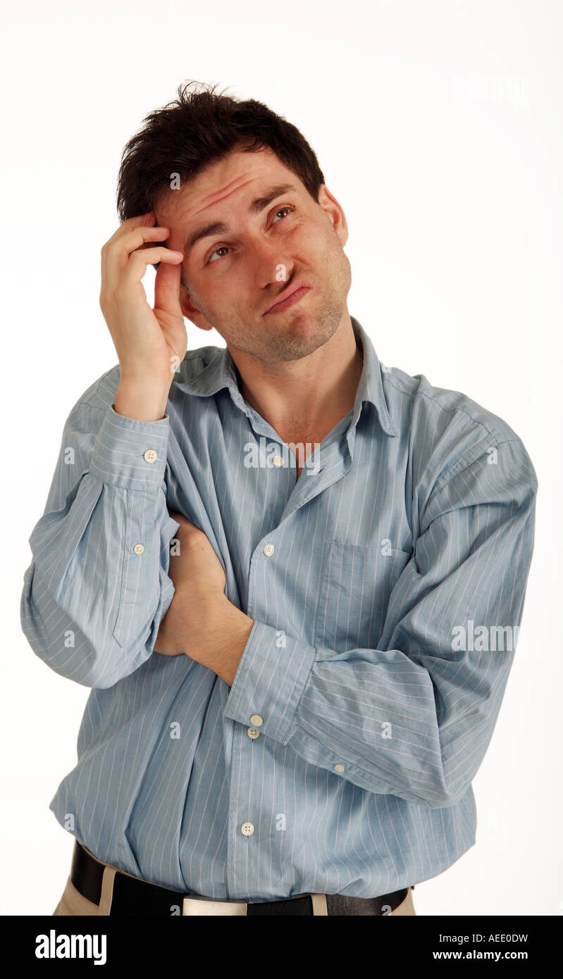 Young man looking confused Stock Photo - Alamy