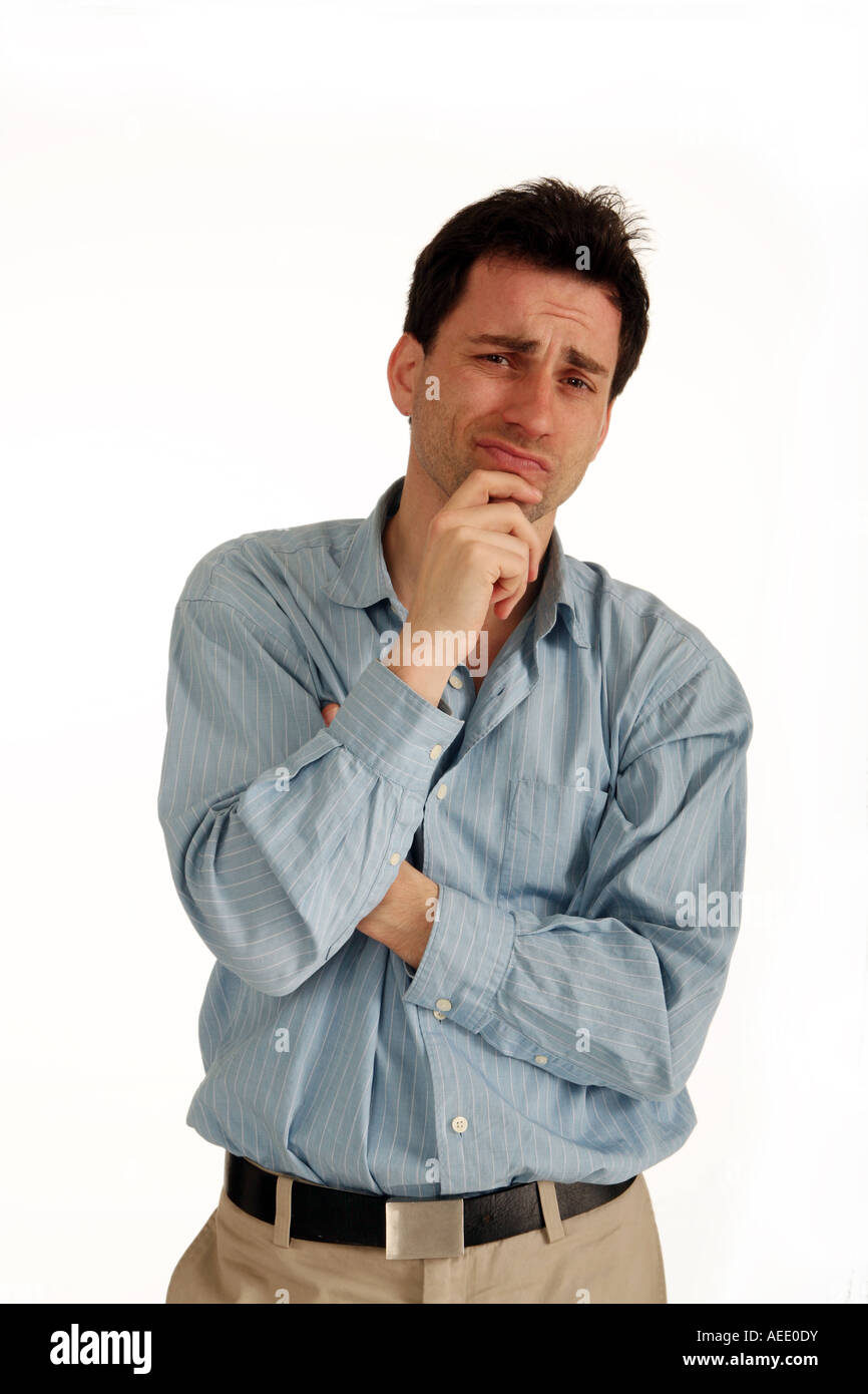 Young man looking confused Stock Photo - Alamy