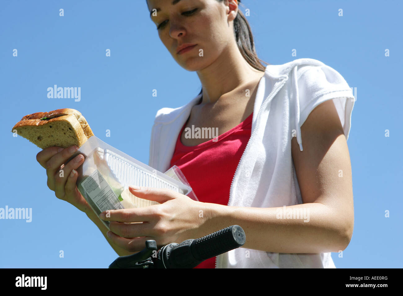 Young Woman Eating Cheese Salad Sandwich Model Released Stock Photo - Alamy