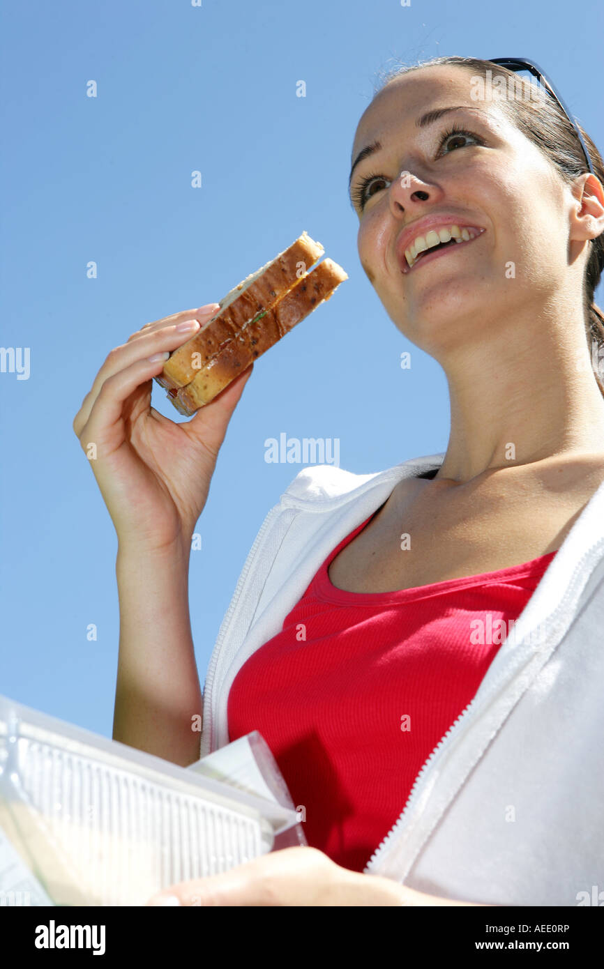 Young Woman Eating Cheese Salad Sandwich Model Released Stock Photo - Alamy