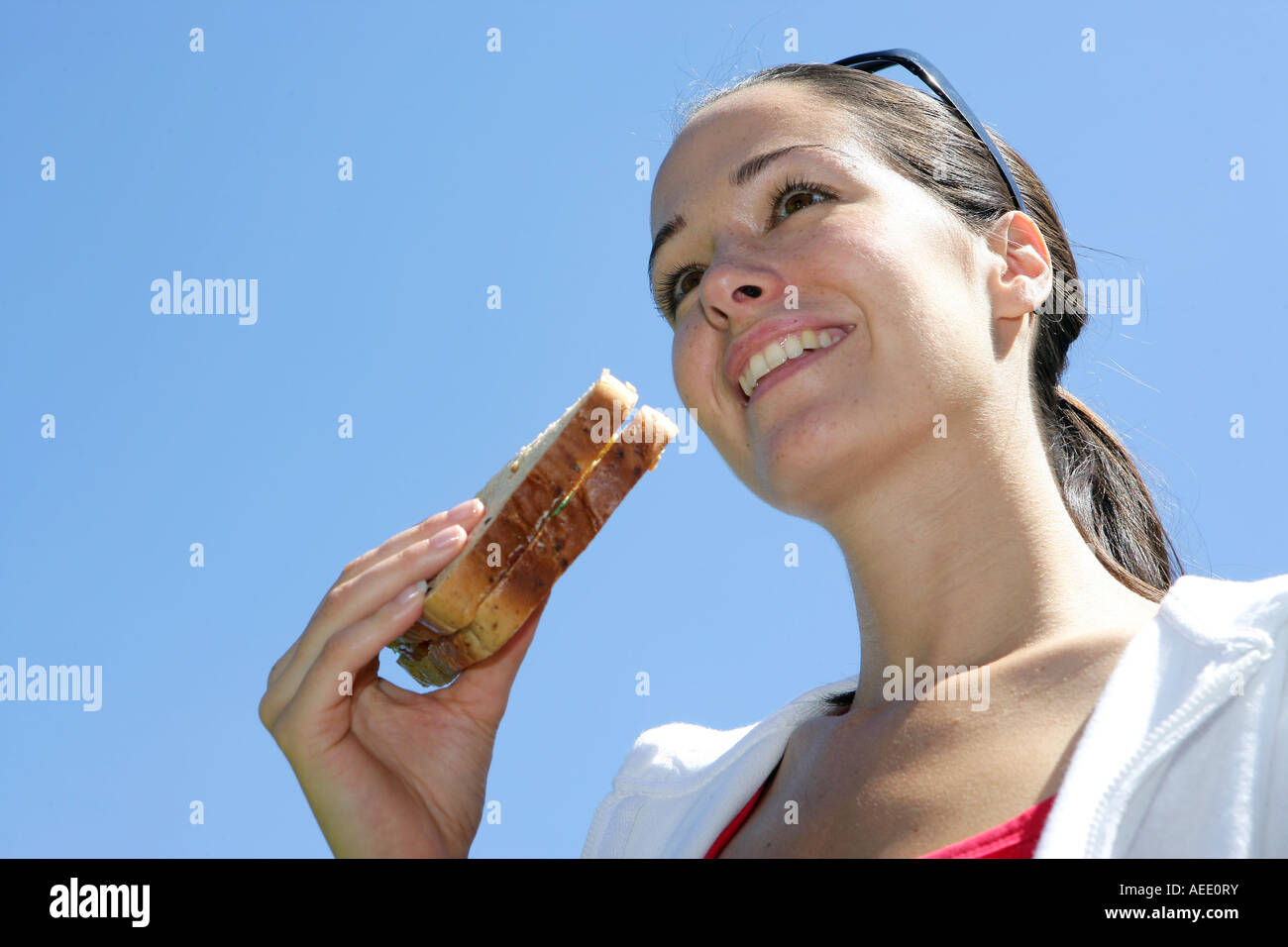 Young Woman Eating Cheese Salad Sandwich Model Released Stock Photo - Alamy