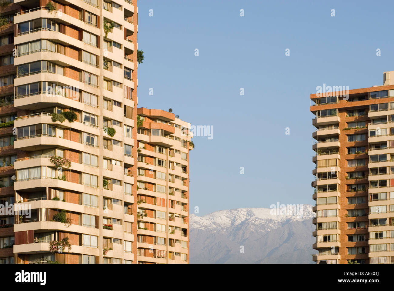 Apartment buildings with the Andes mountains in the background ...