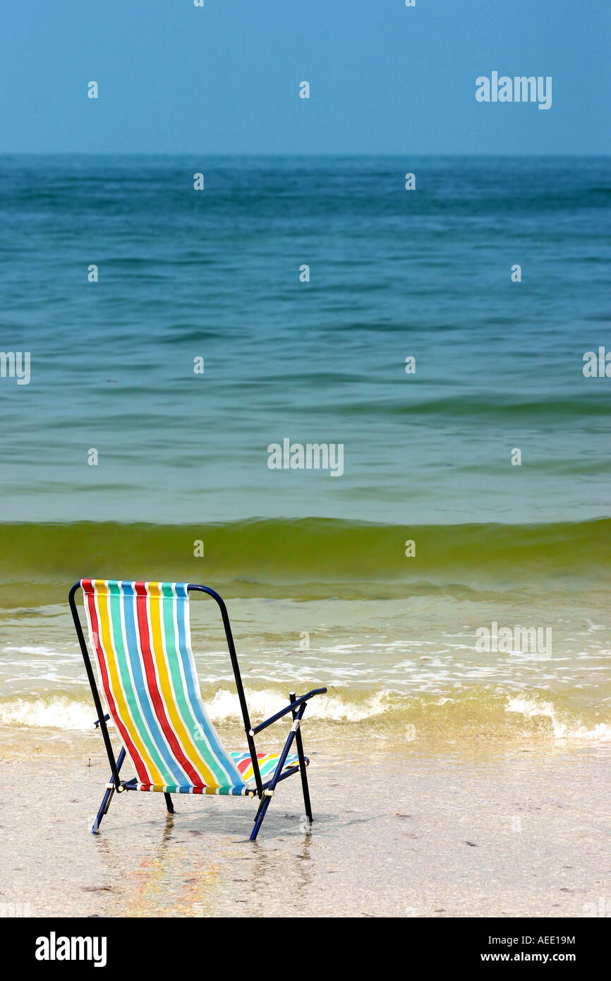 Lone chair at the beach Madeira Beach Fl Stock Photo - Alamy